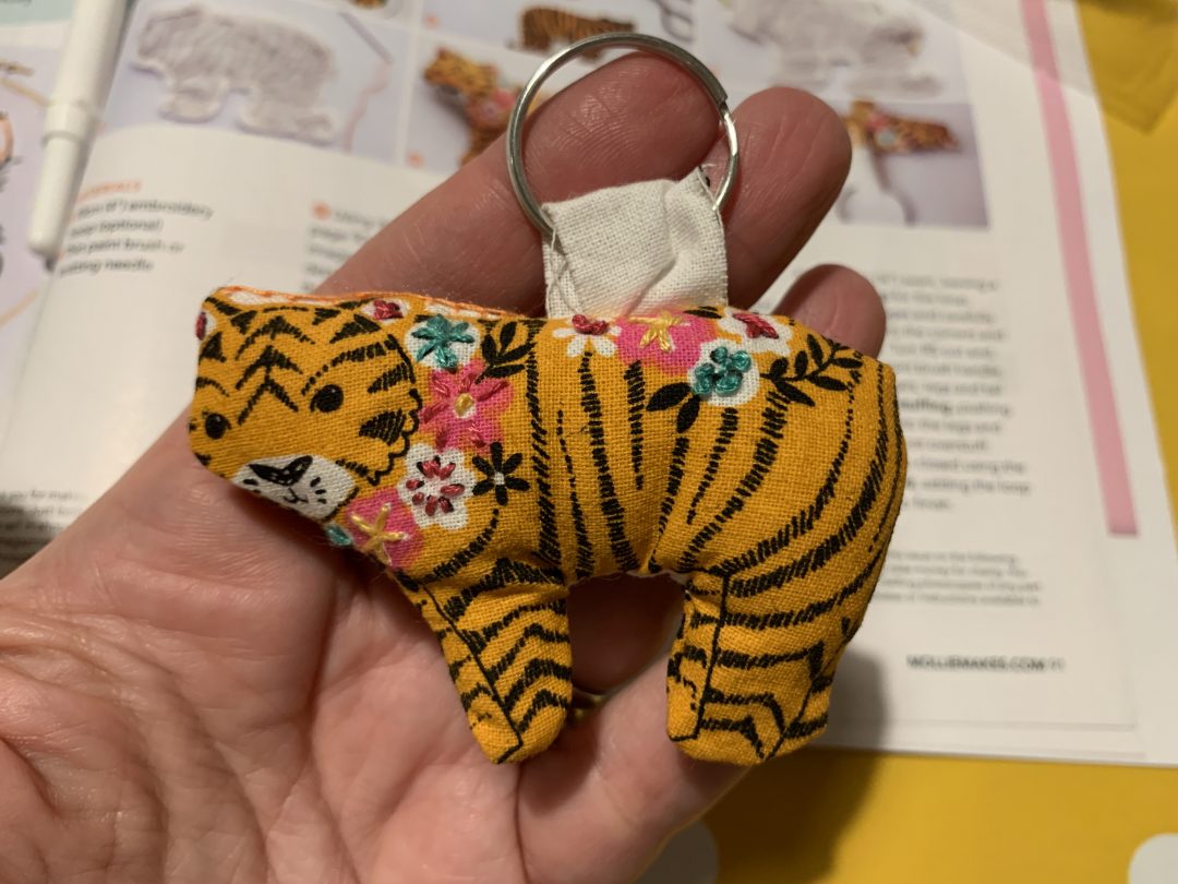 Stitching an embroidered tiger keyring - the-gingerbread-house.co.uk